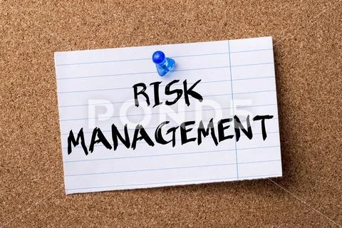 RISK MANAGEMENT - teared note paper pinned on bulletin board Stock ...