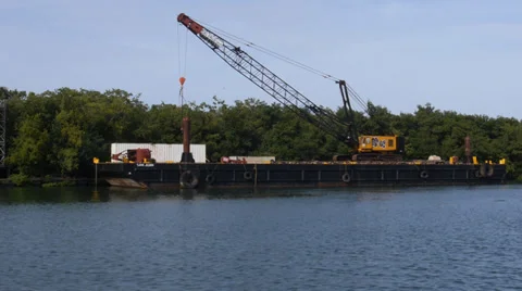 River channel dredge platform sunset | Stock Video | Pond5