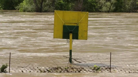 River flooded basketball court. Destroye... | Stock Video | Pond5