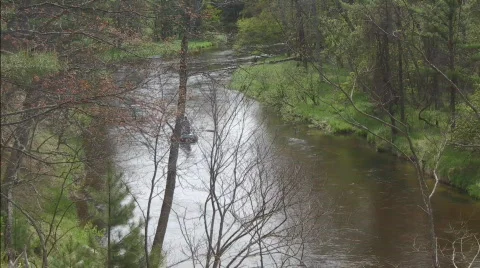 River scene with boat in distance 5 | Stock Video | Pond5