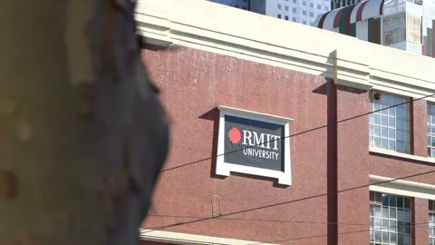 RMIT University logo sign on red brick b... | Stock Video | Pond5