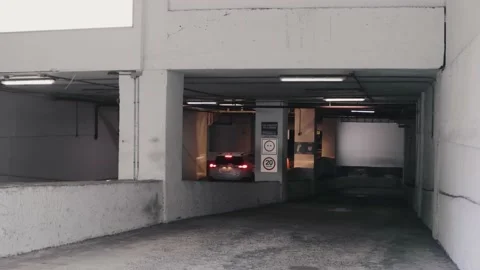 Off-road car entering the ramp to an und... | Stock Video | Pond5