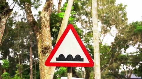 Road Hump sign indicating board | Stock Video | Pond5