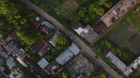 Road leading through slums of Sylhet cit... | Stock Video | Pond5