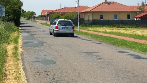 Car Passing The Houses Stock Video Footage | Royalty Free Car Passing ...