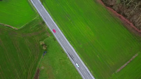 A road is shown in the distance with a g... | Stock Video | Pond5