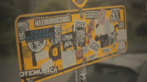 Road sign - graffiti and stickers | Stock Video | Pond5