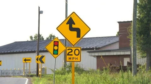Road signs behind a church | Stock Video | Pond5