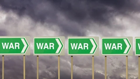 Road signs pointing to war under dark wa... | Stock Video | Pond5