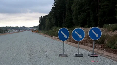 road signs at the side of the road showi... | Stock Video | Pond5