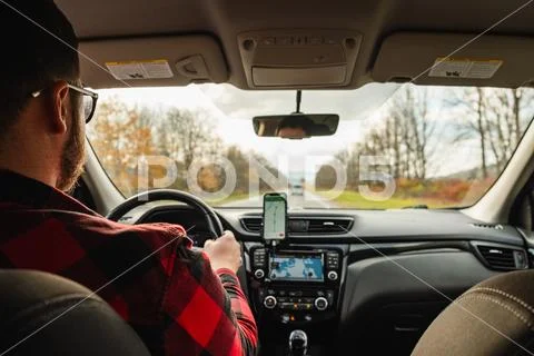 Road trip concept man driving car by highway inside view ~ Hi Res ...