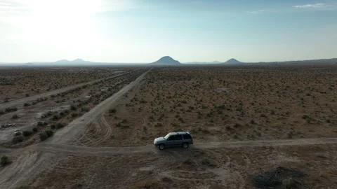 Off road vehicle navigating the Mojave D... | Stock Video | Pond5