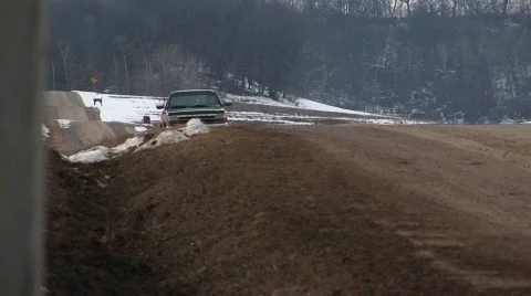 Roadside ditch along a rural two-lane ro... | Stock Video | Pond5
