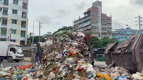 Roadside garbage dump. City waste proble... | Stock Video | Pond5