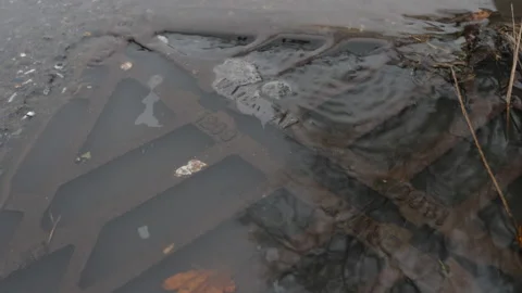 Roadside storm drain overflowing with ro... | Stock Video | Pond5