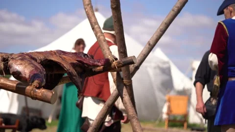 Roasting Meat At Medieval Camp With Acto... | Stock Video | Pond5