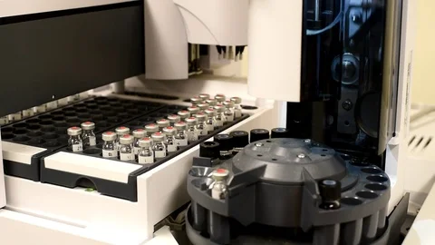 Robot arm removing chemical compound int... | Stock Video | Pond5