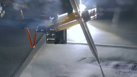 Robotic arm with pen drawing portrait | Stock Video | Pond5