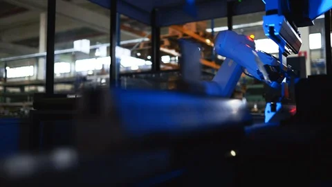 Robotic cnc arm moving a sheet of metal ... | Stock Video | Pond5