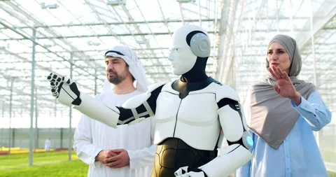 Robotic cyborg speaking with muslim man ... | Stock Video | Pond5