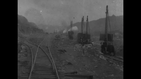 Rock is dynamited and removed by steam s... | Stock Video | Pond5