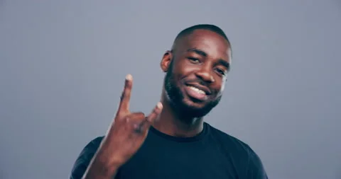 Rock, hand gesture or face of African ma... | Stock Video | Pond5