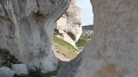 rock mass in the background of the city | Stock Video | Pond5