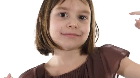 Rock N Roll hand gesture. Little girl sh... | Stock Video | Pond5