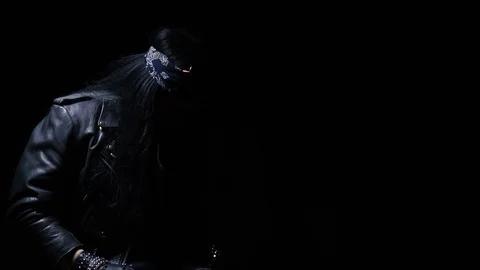 A rocker sitting in the dark and showing... | Stock Video | Pond5