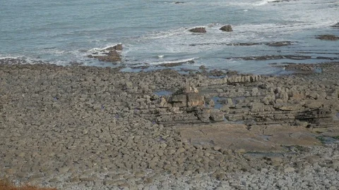 Rocky course beach at Millook Haven | Stock Video | Pond5
