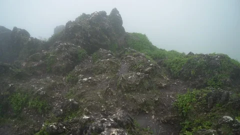 Rocky path in a cloudy storm at the top ... | Stock Video | Pond5