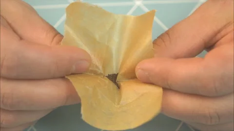 Roll drug powder into a bundle. Drug dos... | Stock Video | Pond5