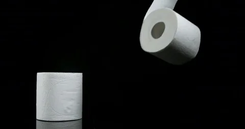 Roll of Toilet Paper Falling on Black Ba... | Stock Video | Pond5