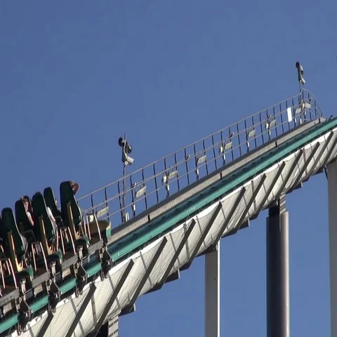 Roller coaster ride first big climb on a... | Stock Video | Pond5