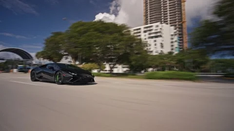 Rolling shot of black Lamborghini Huraca... | Stock Video | Pond5