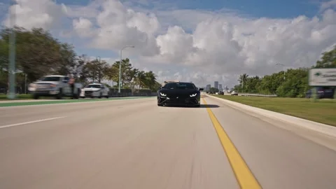 Rolling shot of black Lamborghini Huraca... | Stock Video | Pond5