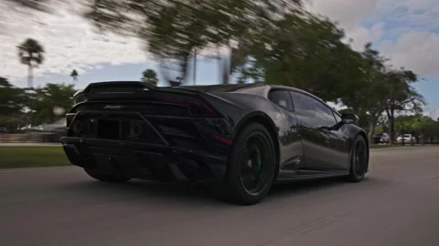 Rolling shot of black Lamborghini Huraca... | Stock Video | Pond5
