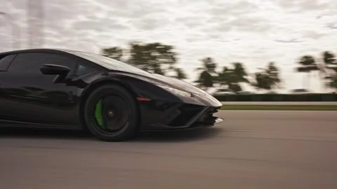 Rolling shot of black Lamborghini Huraca... | Stock Video | Pond5
