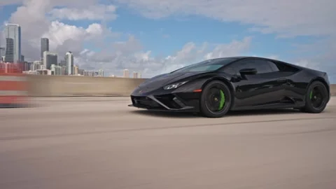Rolling shot of black Lamborghini Huraca... | Stock Video | Pond5
