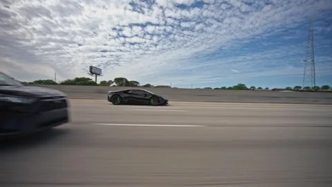 Rolling shot of black Lamborghini Huraca... | Stock Video | Pond5