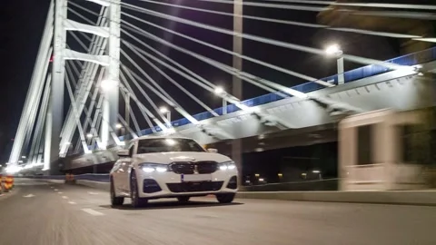 Rolling shot of a BMW 3 series, luxury s... | Stock Video | Pond5