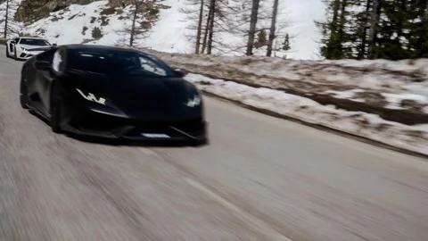 Rolling shot of Lamborghini Aventador an... | Stock Video | Pond5