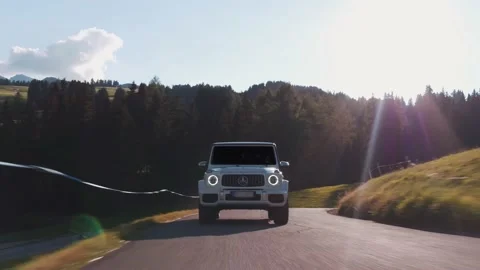 Rolling shot of Mercedes Benz G Class SU... | Stock Video | Pond5