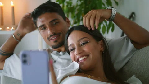 Romantic couple enjoying movie home clos... | Stock Video | Pond5