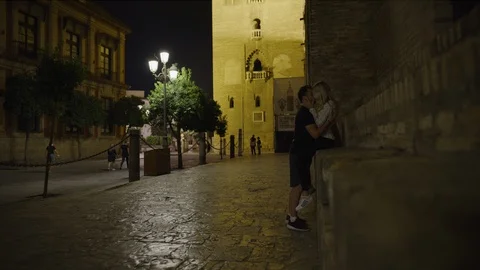 Romantic couple leaning on building hugg... | Stock Video | Pond5