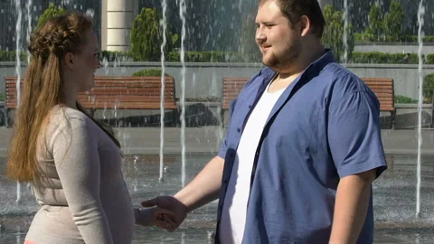 Romantic couple of overweight people kis... | Stock Video | Pond5