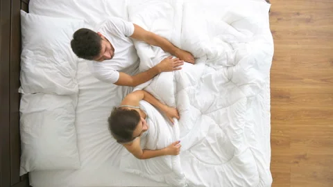 The romantic couple playing in the bed. ... | Stock Video | Pond5