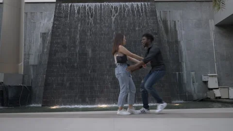 Romantic couple run to each other and hu... | Stock Video | Pond5