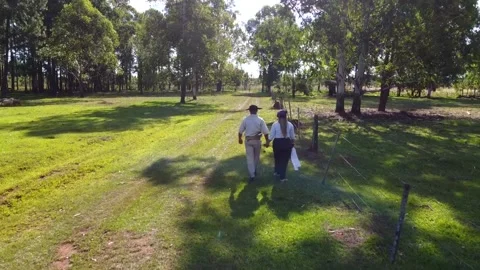 Romantic farming couple walk holding han... | Stock Video | Pond5