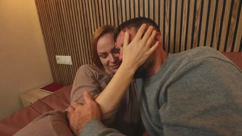 Romantic partners cuddling intimately, k... | Stock Video | Pond5